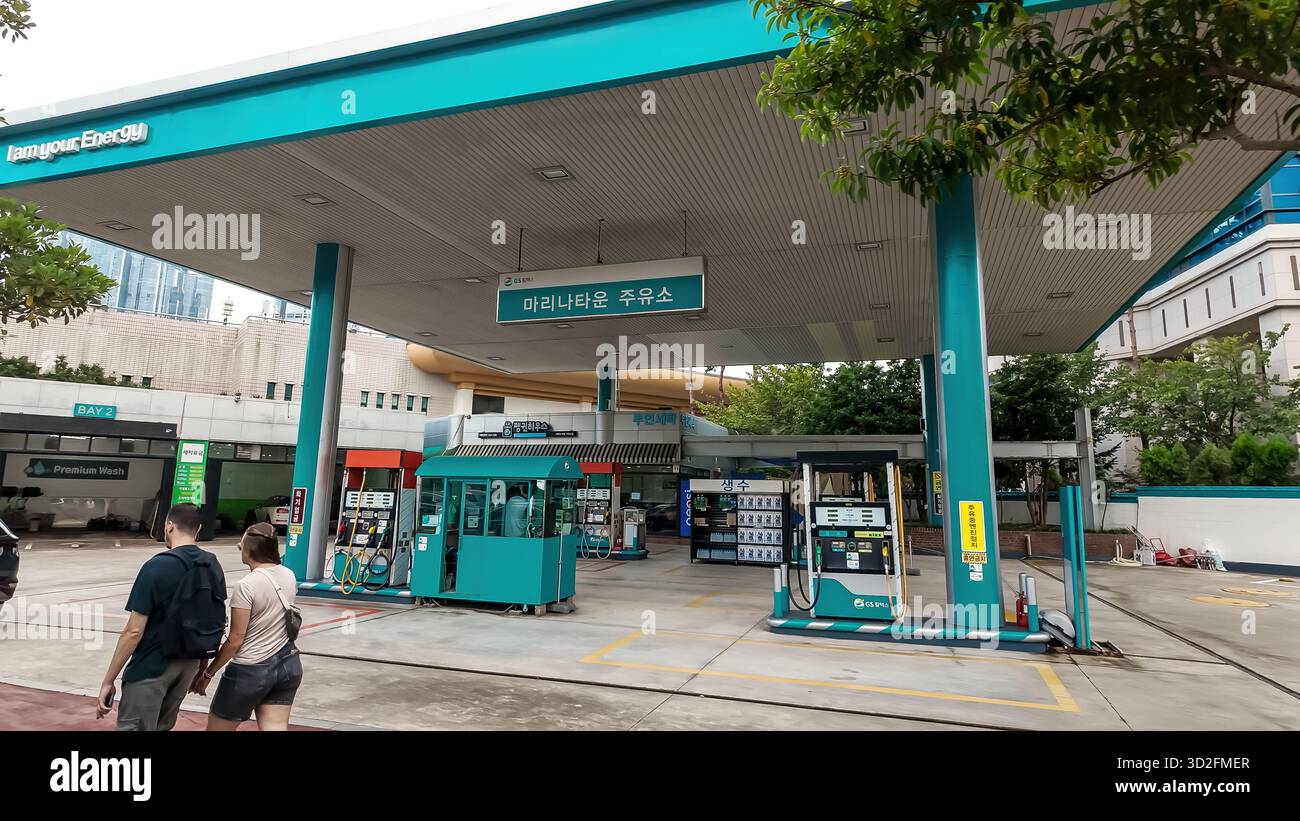 BUSAN, SOUTH KOREA - OCTOBER 10, 2025 - Gas station operating services ...