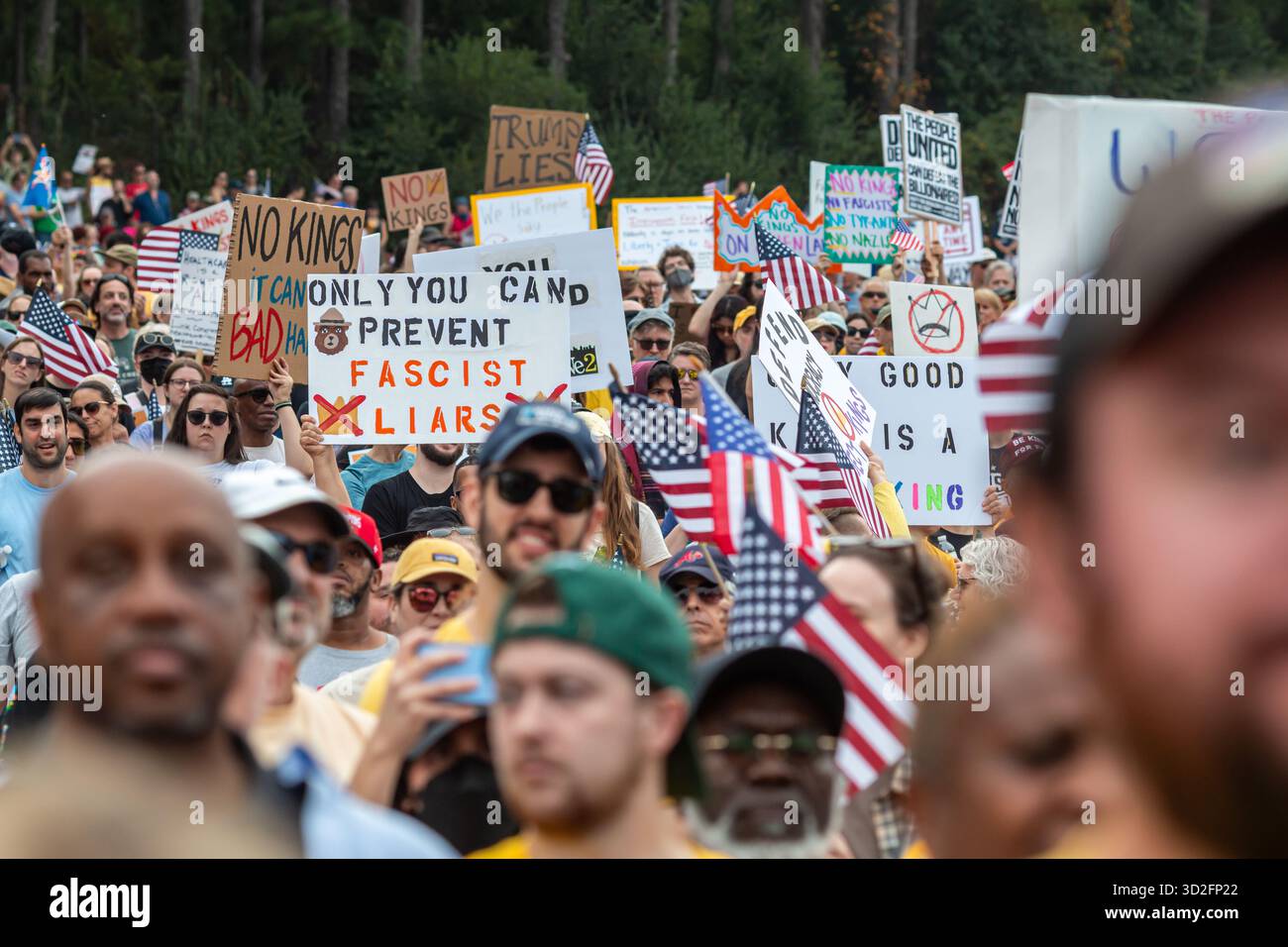Atlanta, GA / USA - October 18, 2025: A huge crowd displaying anti ...