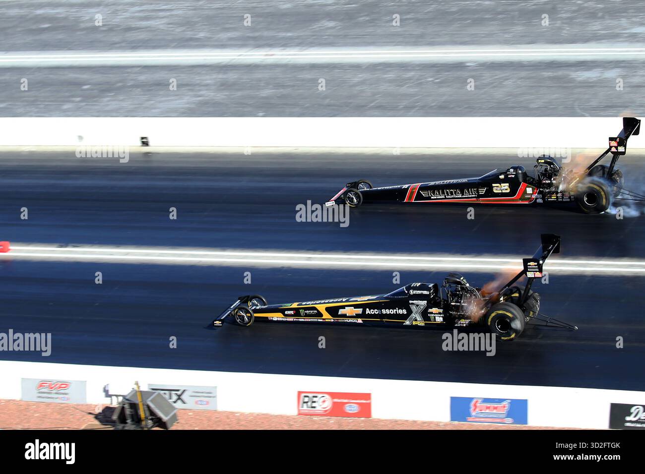 LAS VEGAS, NV - OCTOBER 31: Brittany Force (bottom lane) races Shawn ...