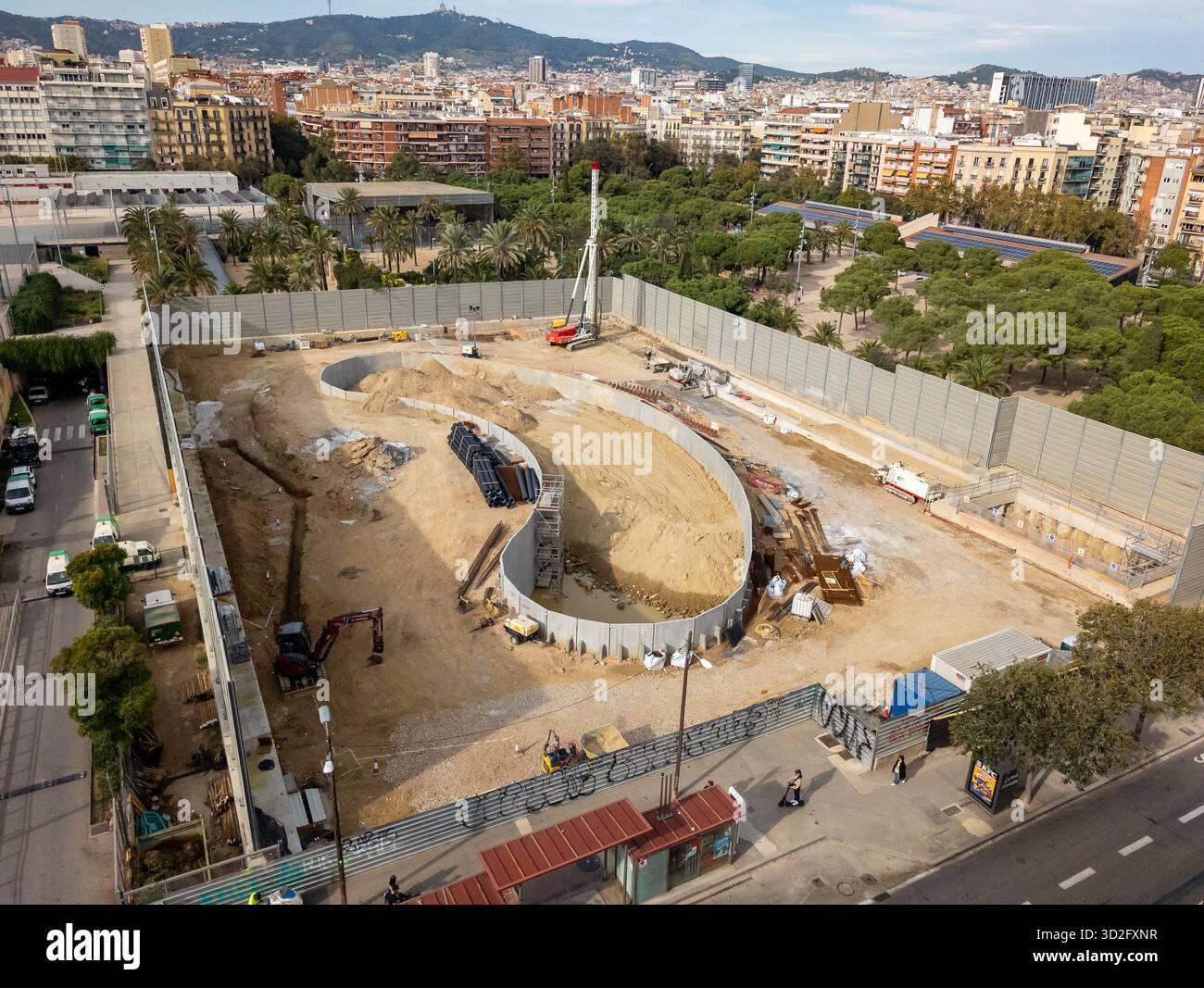 Aerial view showing construction machinery on urban building site in ...