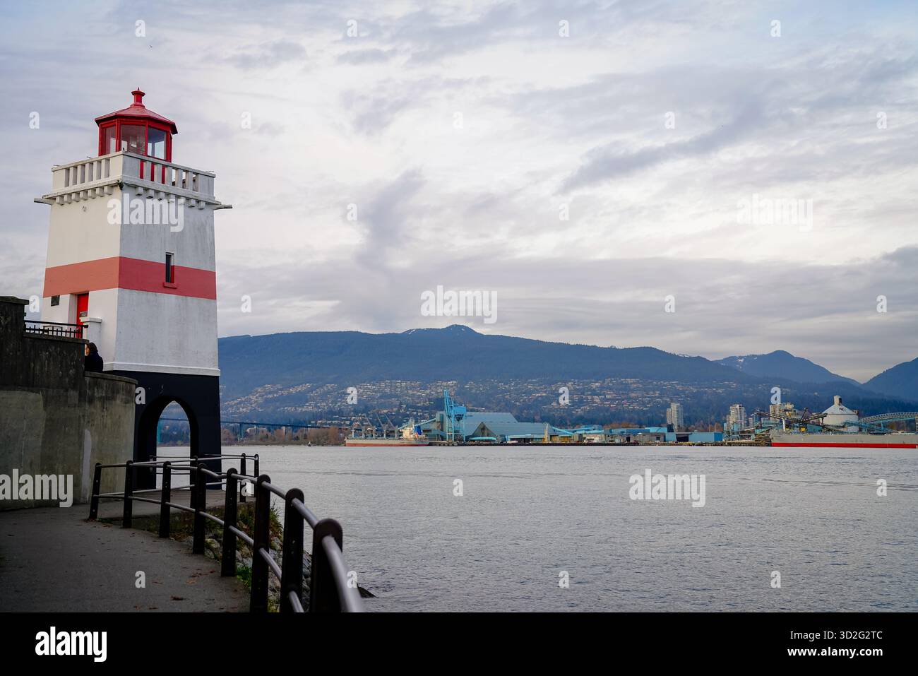 The Brockton Point Lighthouse stands above the seawall in Stanley Park ...