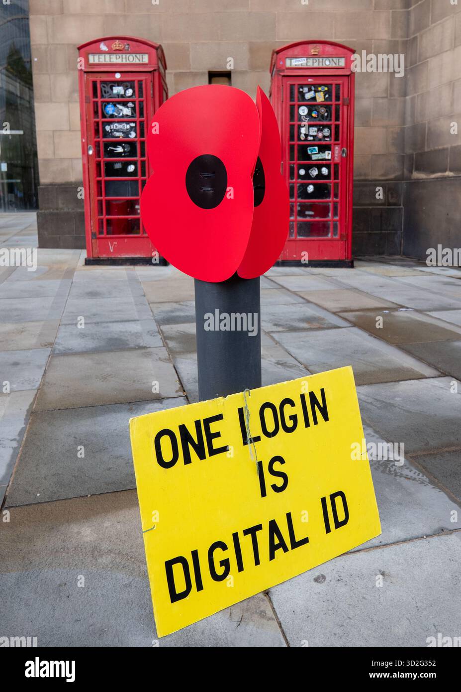 Anti Digital ID placards have been tied to posts used to display ...