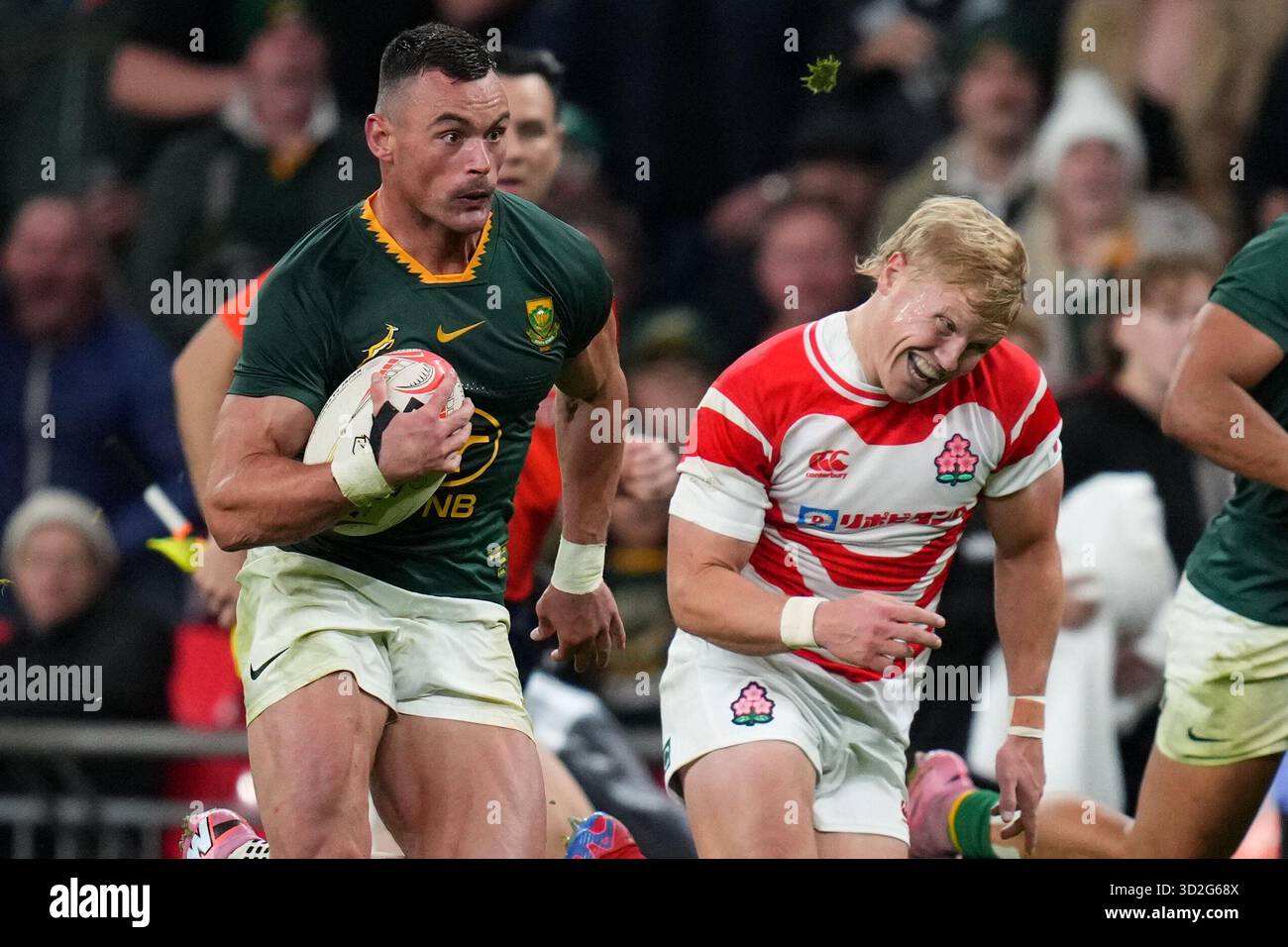 South Africa's Jesse Kriel runs with the ball to score a try during the ...