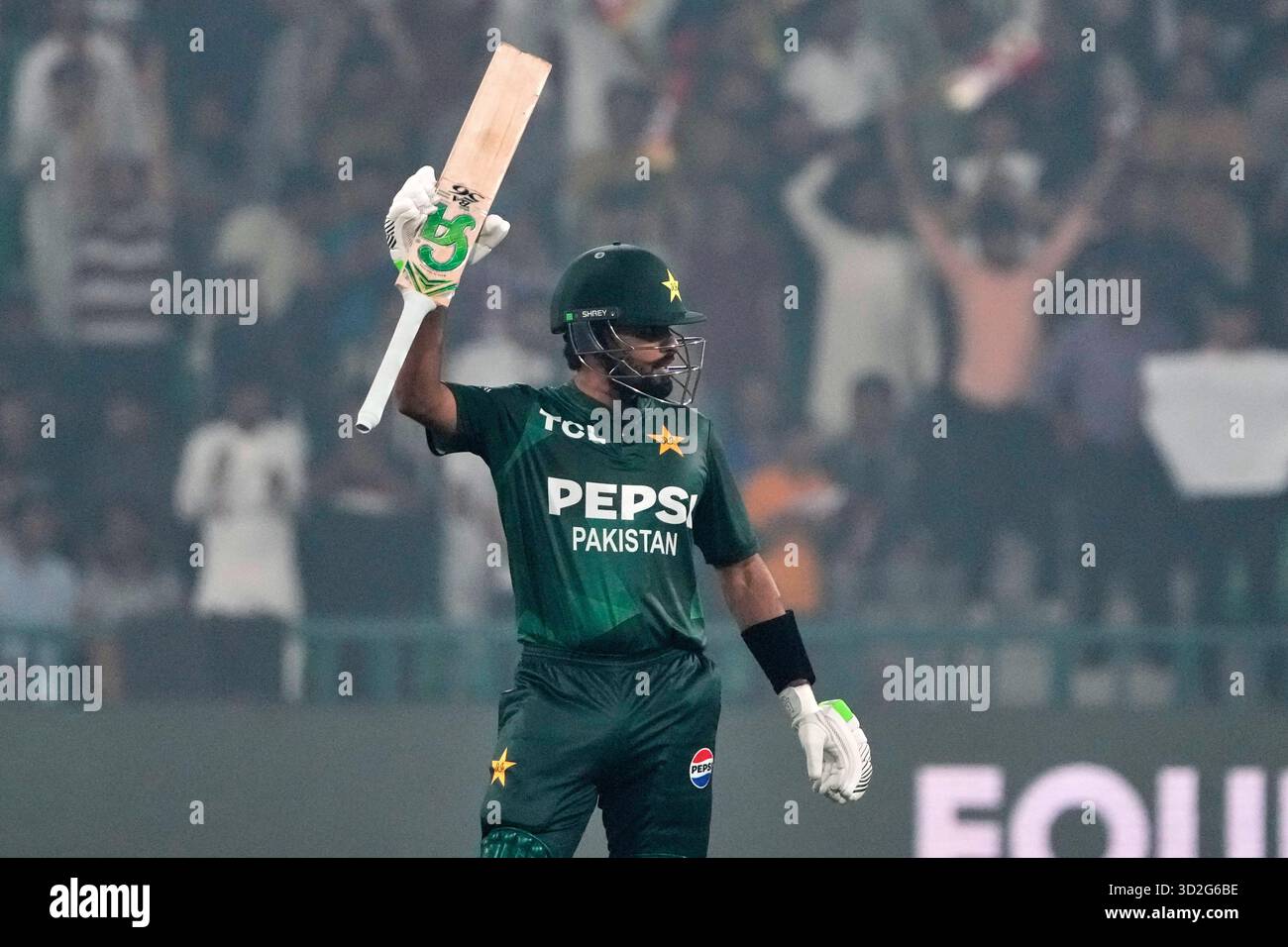 Pakistan's Babar Azam celebrates after scoring fifty during the third ...