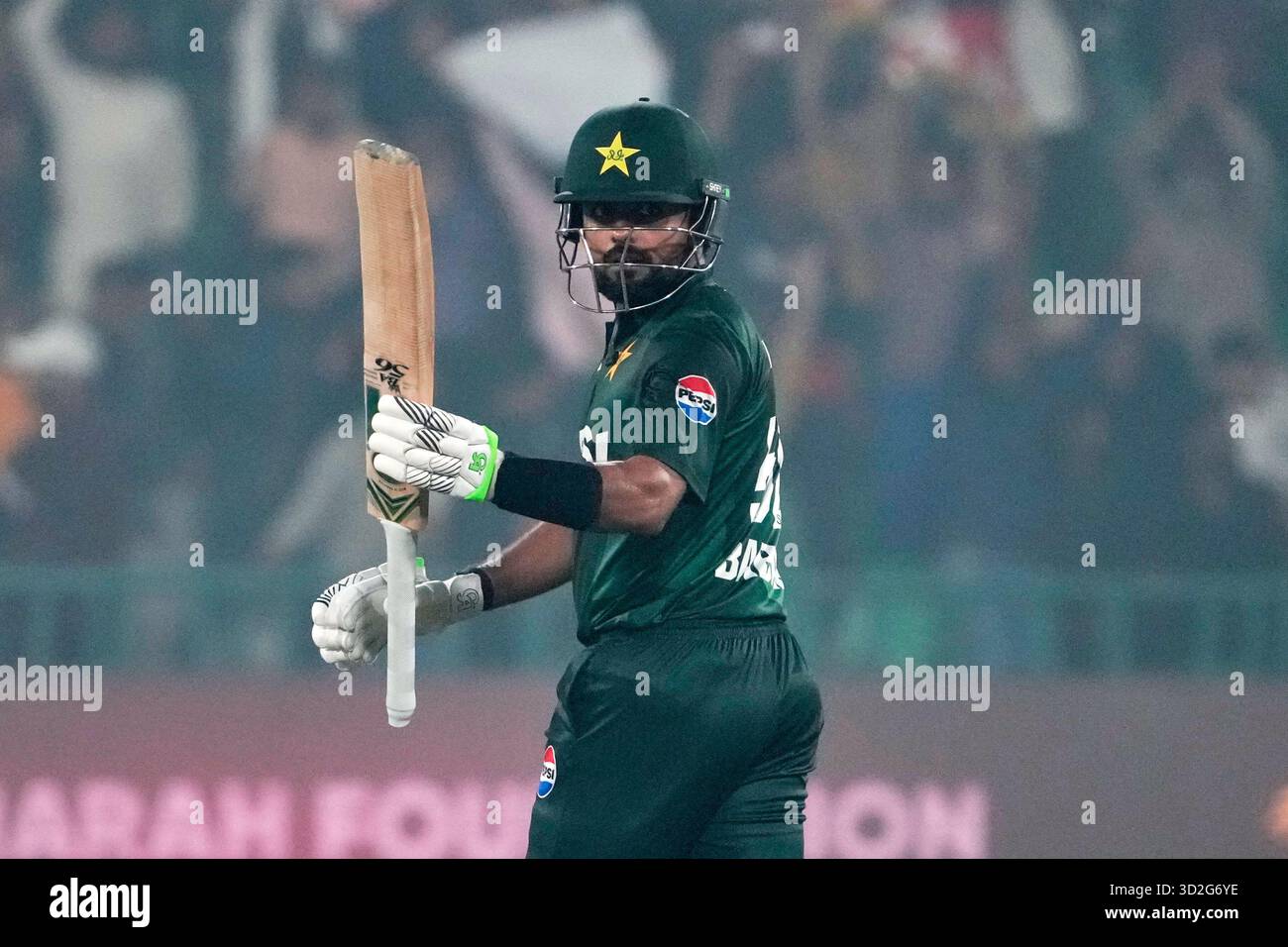 Pakistan's Babar Azam celebrates after scoring fifty during the third ...