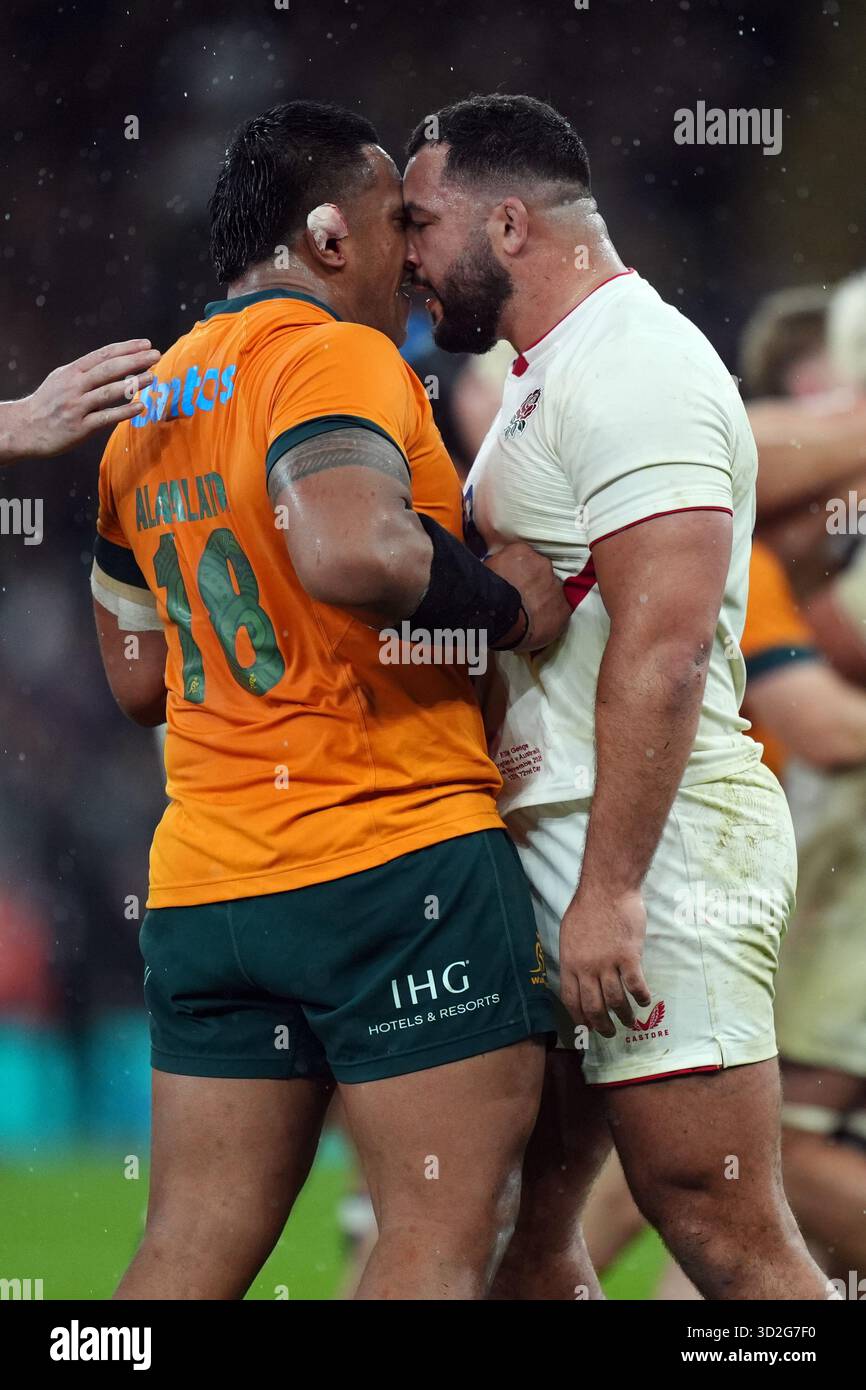 England’s Ellis Genge (right) and Australia’s Allan Alaalatoa clash ...