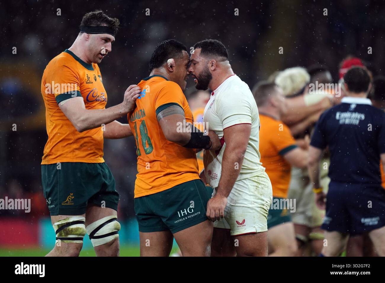 England’s Ellis Genge (right) and Australia’s Allan Alaalatoa clash ...