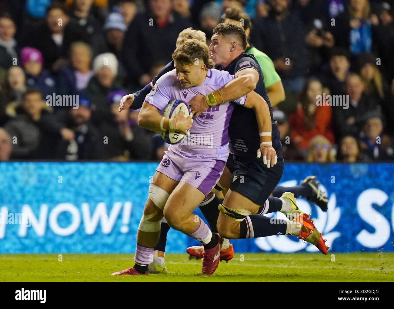 Scotland's Kyle Rowe runs for the line to score a try in the second ...