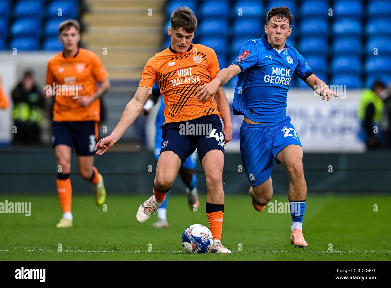 Cian Ashford (45 Cardiff City) challenged by Harry Leonard (27 ...