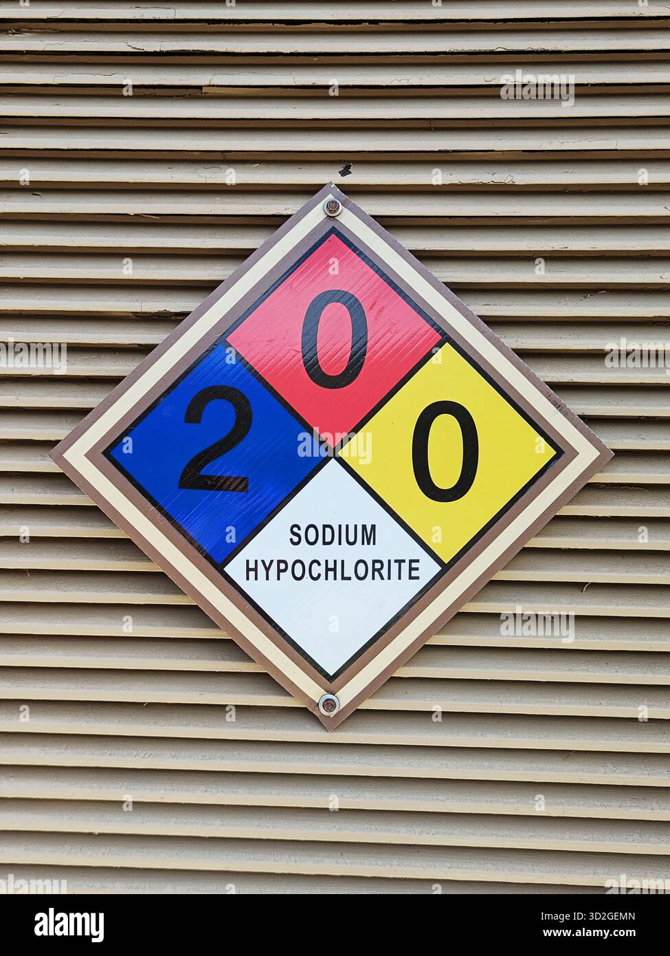 Diamond shaped NFPA panel identifying hazardous at public pool. Sodium ...