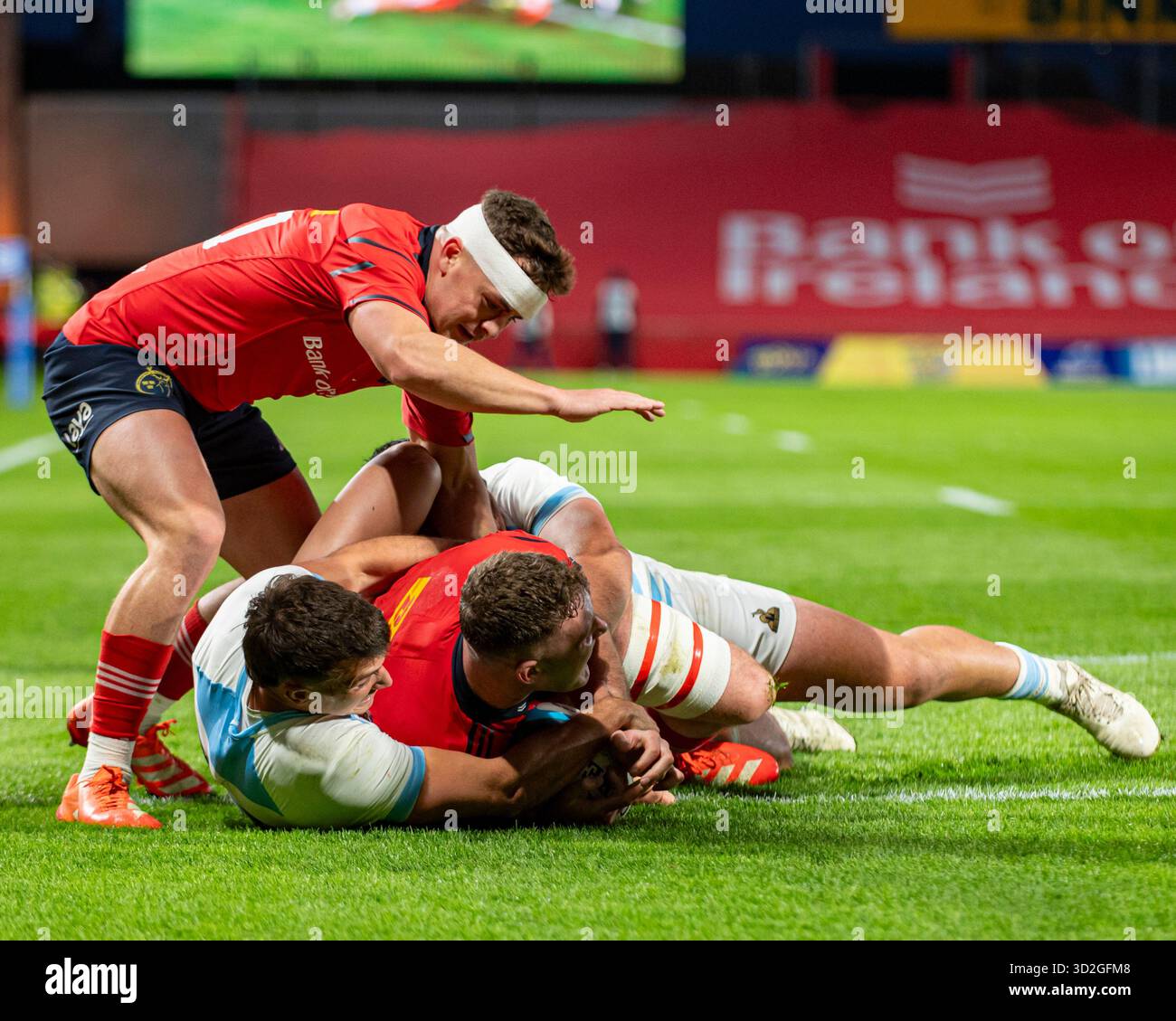 Evan O'Connell of Munster scores a try during the international ...