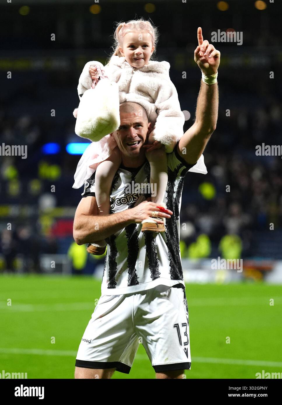 St Mirren's Alex Gogic celebrates with his daughter after the final ...