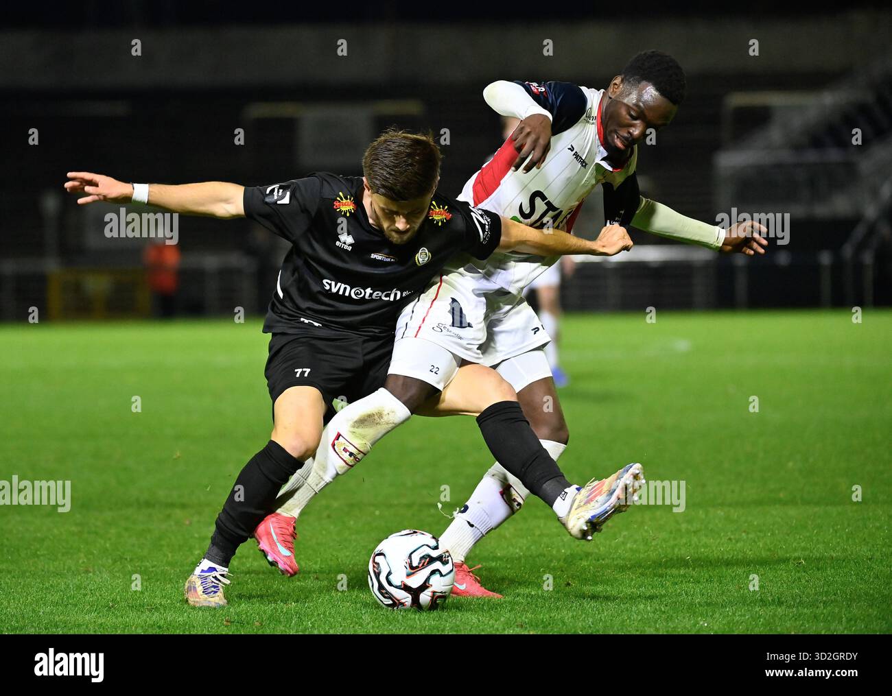 Olympic's Luca Ferrara and Liege's Fadel Gobitaka fight for the ball ...
