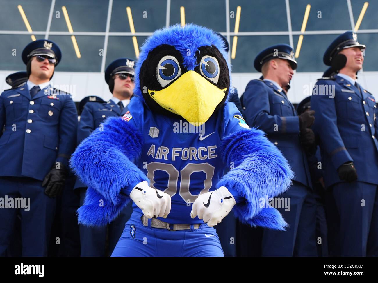 Air Force mascot The Bird poses with cadets during the first half of a ...