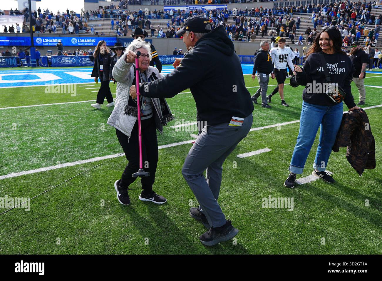 Army head coach Jeff Monken hugs his mother Nancy after a win over Air ...