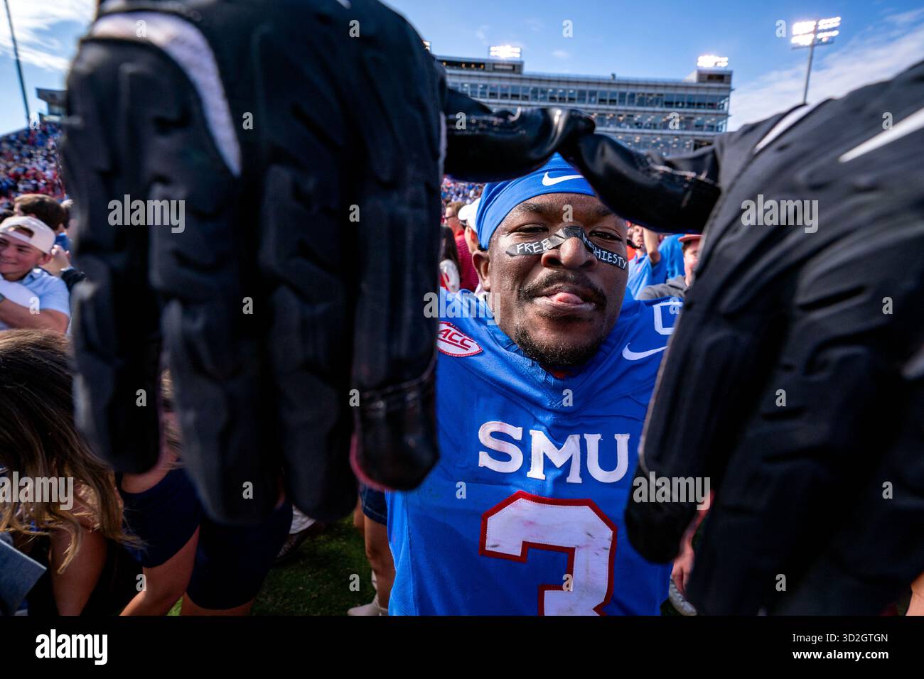SMU safety Ahmaad Moses celebrates on the field with fans after his ...