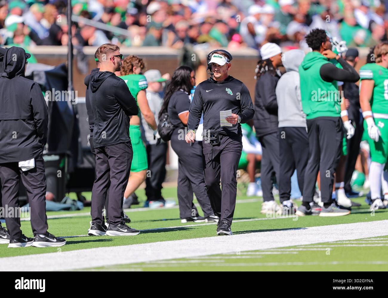 November 01, 2025:.North Texas Mean Green head coach Eric Morris walks ...