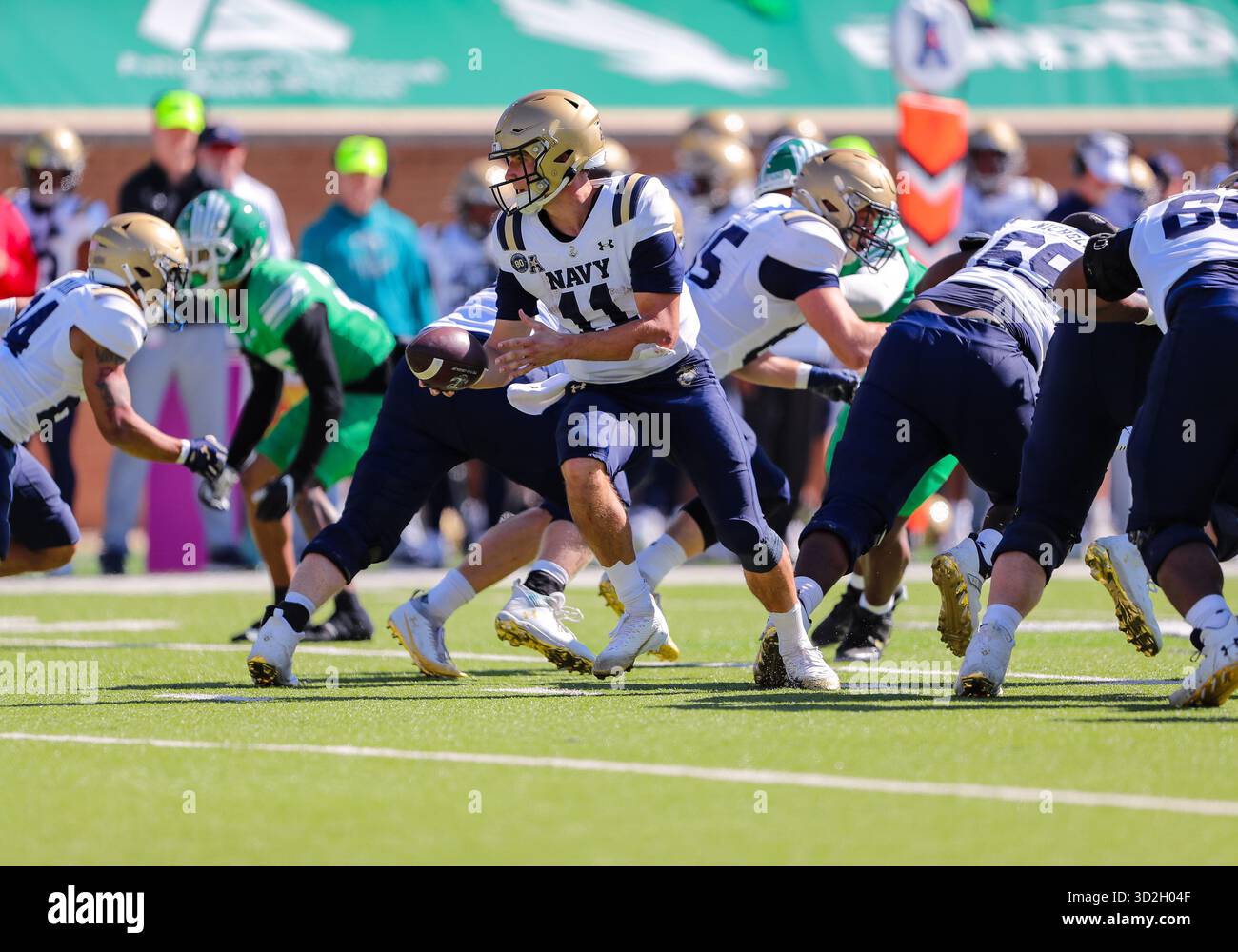 November 01, 2025:.Navy Midshipmen quarterback Blake Horvath (11) hands ...