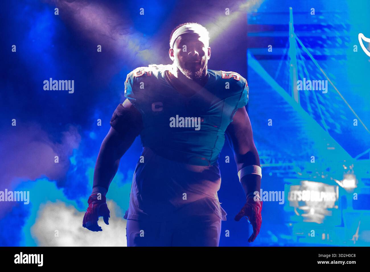 Miami Dolphins offensive lineman Aaron Brewer (55) runs onto the field ...