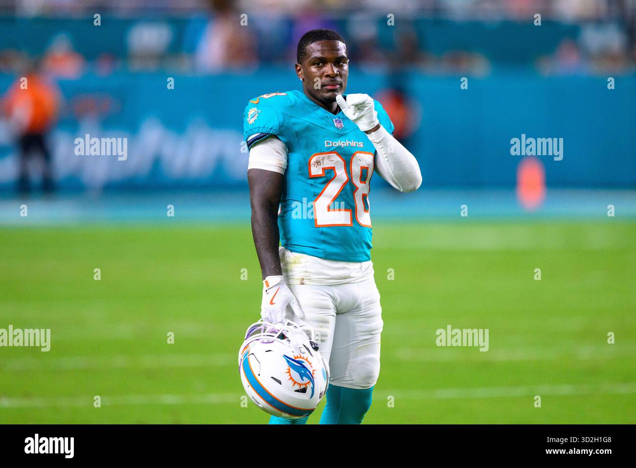 Miami Dolphins running back De'Von Achane (28) stands on the field ...