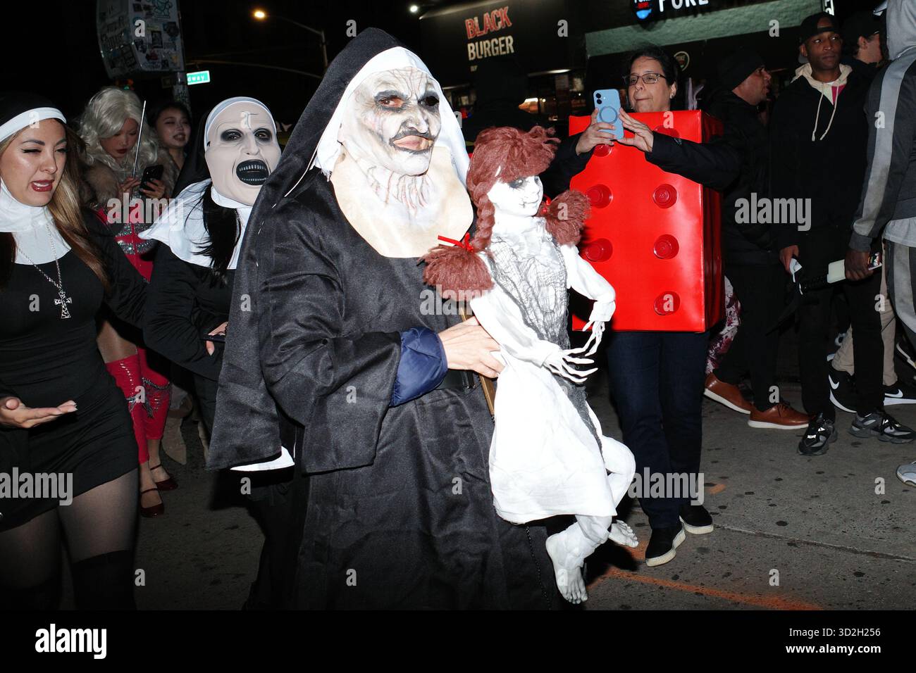 Revellers at the NYC Halloween Village Parade in New York, NY on ...