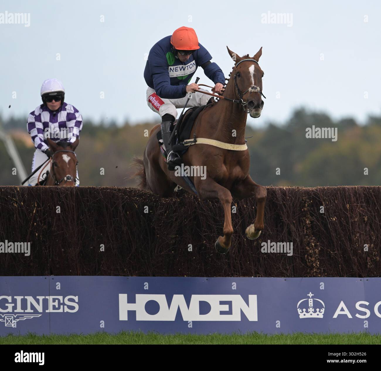 Ascot, UK. 1 November, 2025. No Questions Asked (orange cap) ridden by ...