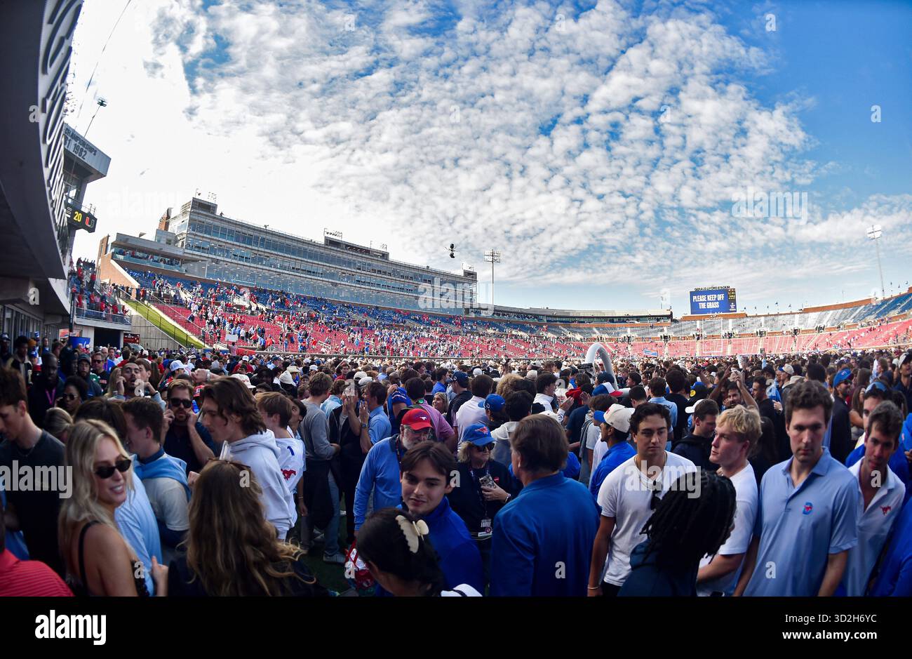 DALLAS, TX - NOVEMBER 01: Fans rush the field after a college football ...