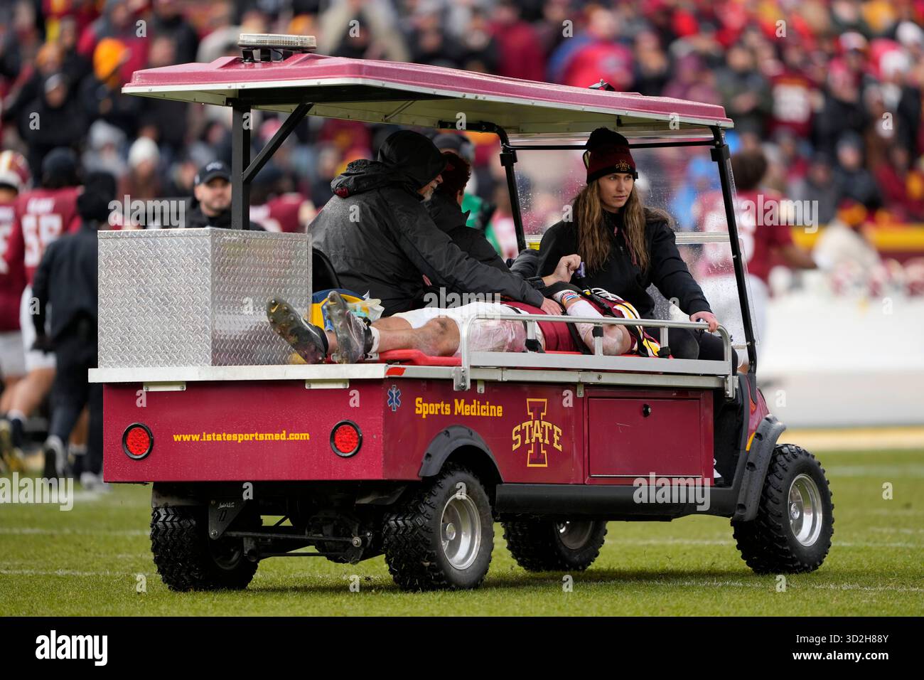 Iowa State tight end Benjamin Brahmer is carted off the field after ...