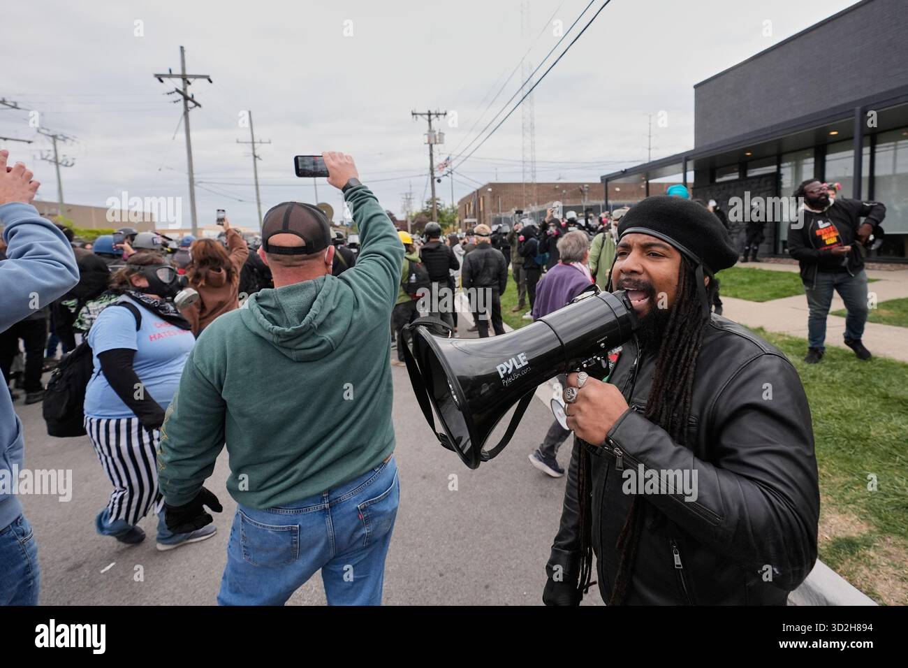 Protesters gather outside an ICE processing facility in the Chicago ...