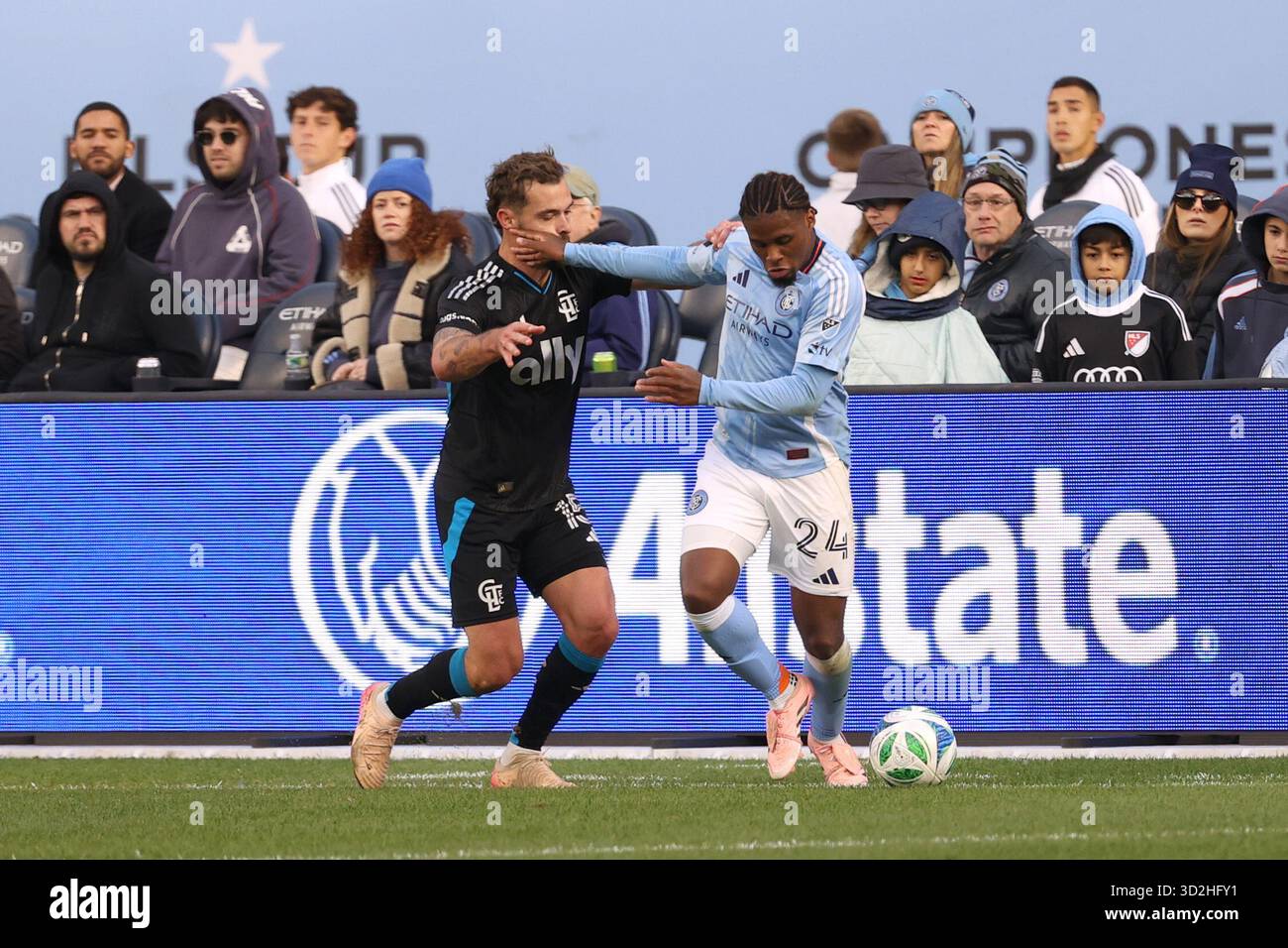 New York City defender Tayvon Gray, right, defends the ball from ...