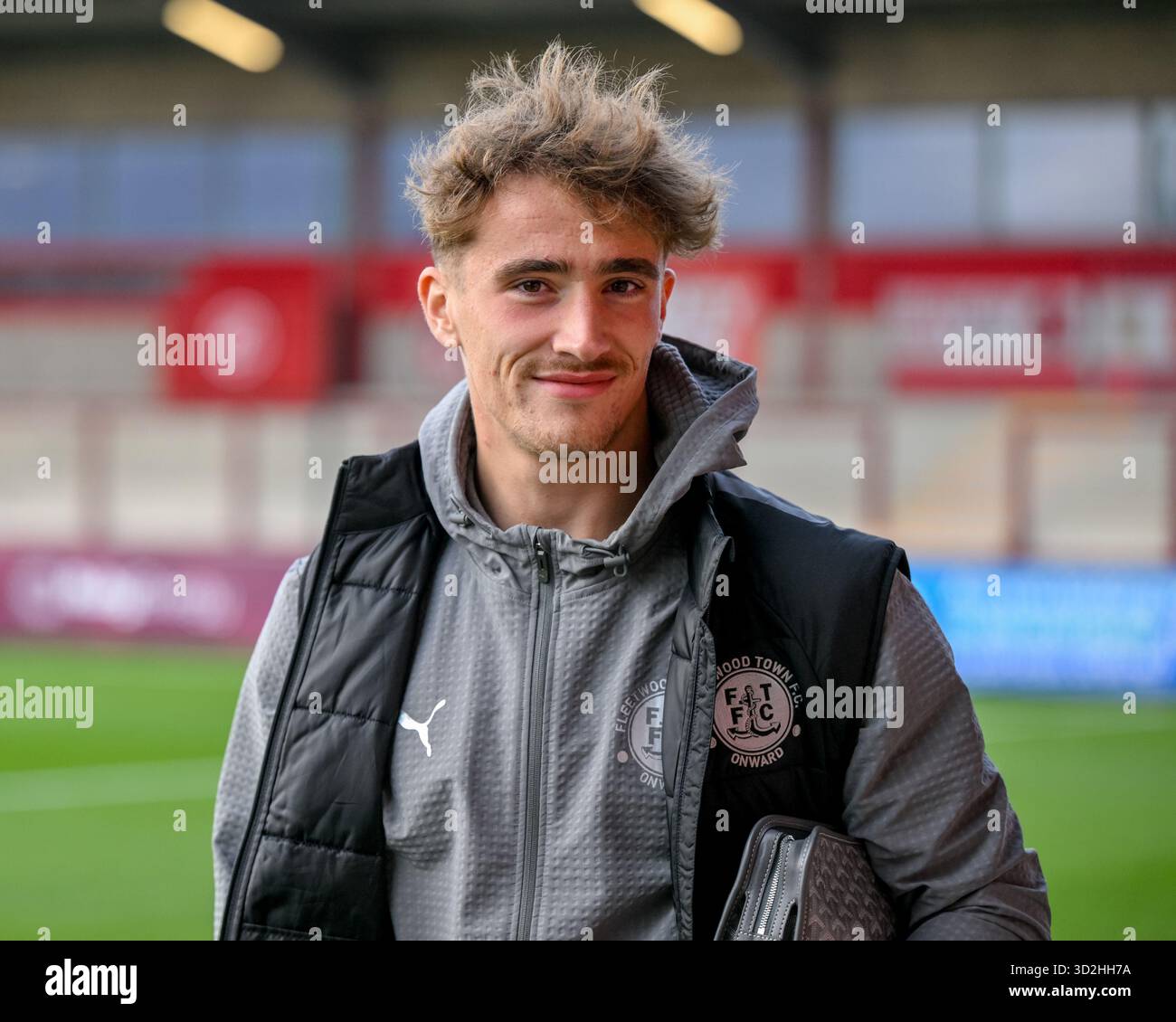 Lewis McCann of Fleetwood Town Ched Evans of Fleetwood Town walking in ...