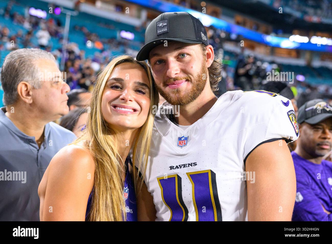 Baltimore Ravens punter Jordan Stout (11) and his wife Julia Falcioni ...