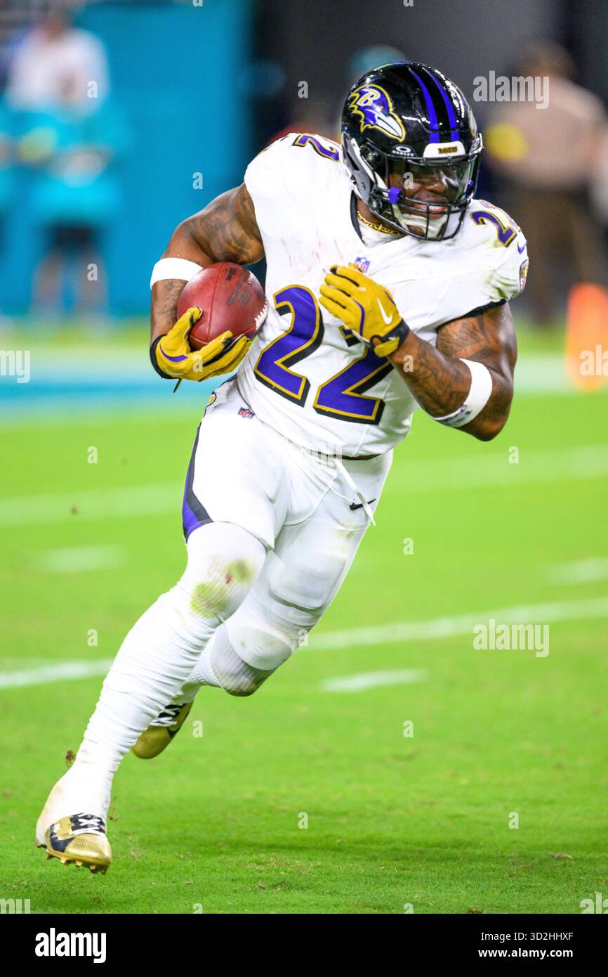 Baltimore Ravens running back Derrick Henry (22) runs with the ball ...