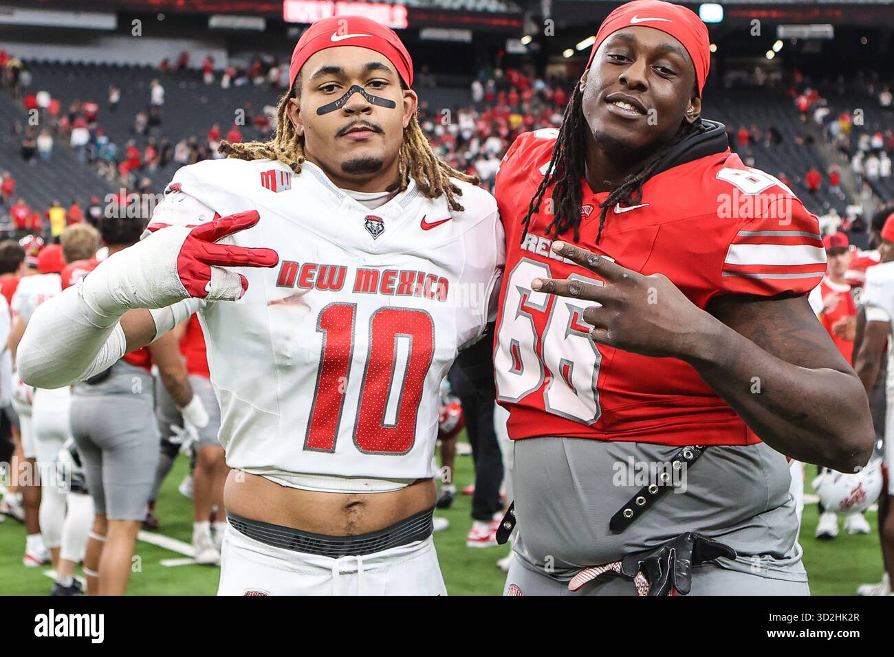 November 1, 2025: (L-R) New Mexico Lobos defensive end Darren Agu (10 ...