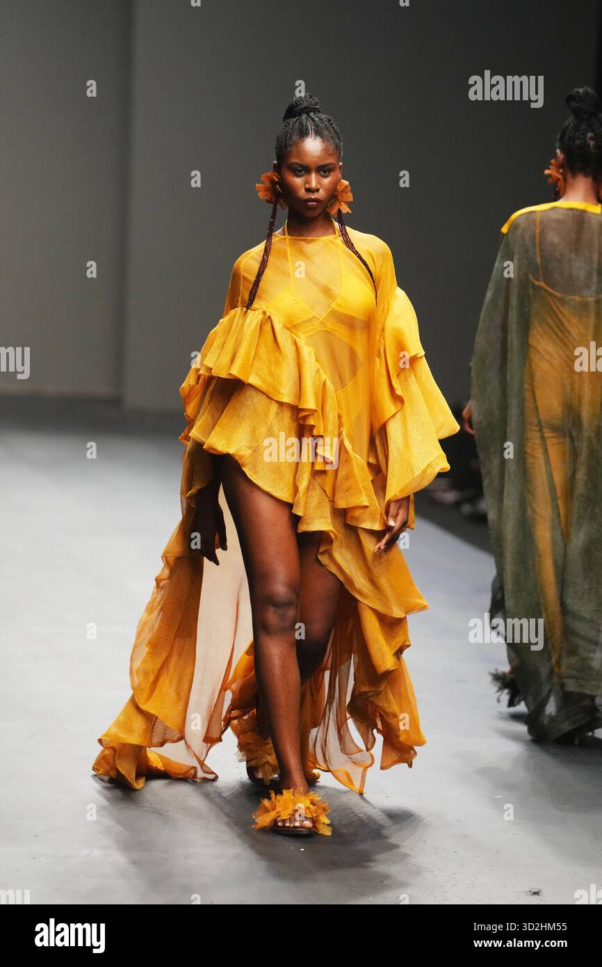 A model wears a creation by designer adama Paris during Fashion Week In ...