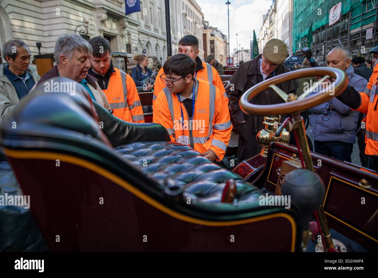 London, UK. 01st Nov, 2025. Members of the RAC repair a vintage car ...