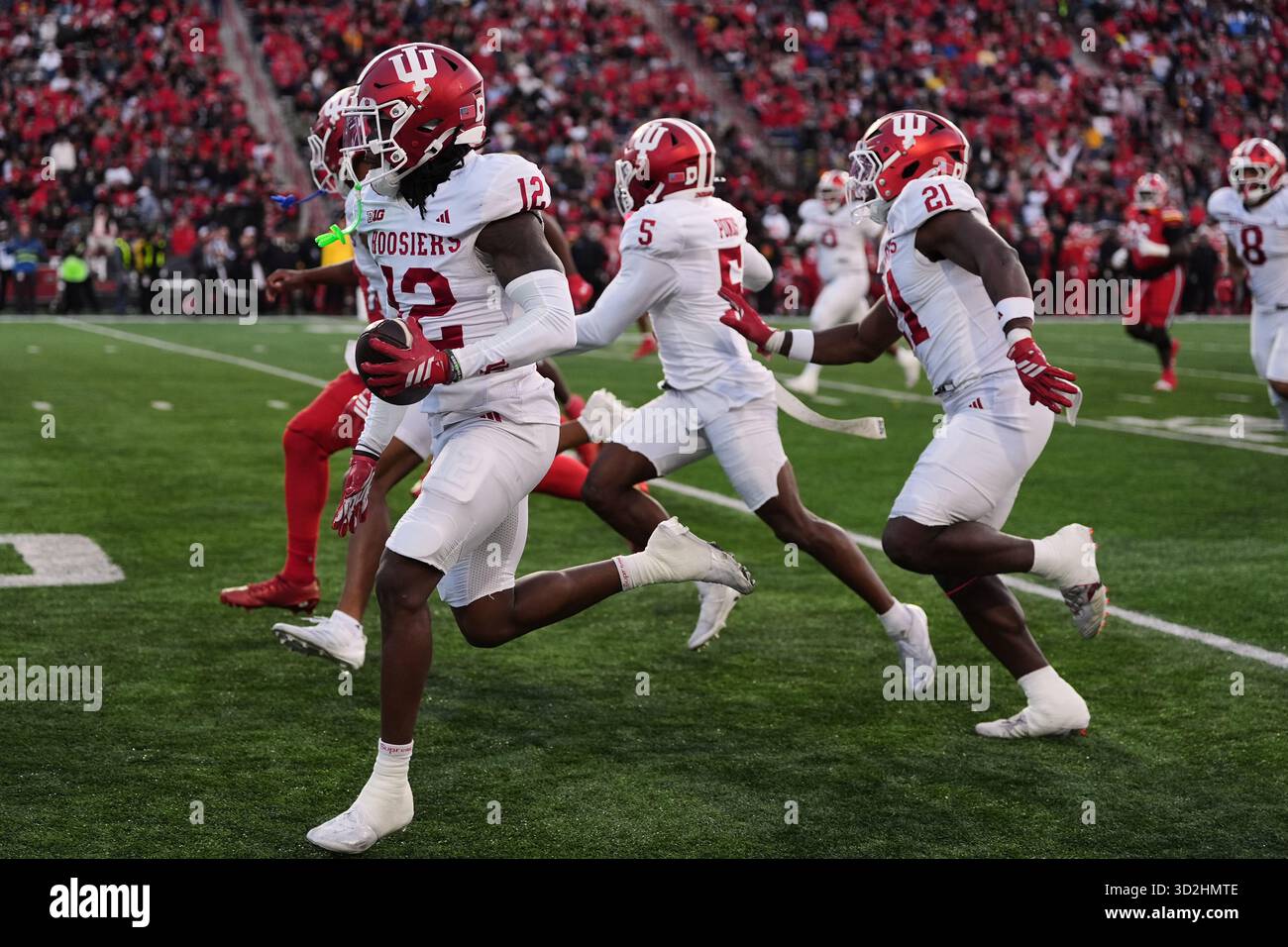 Indiana defensive back Devan Boykin (12) returns a fumble for a ...