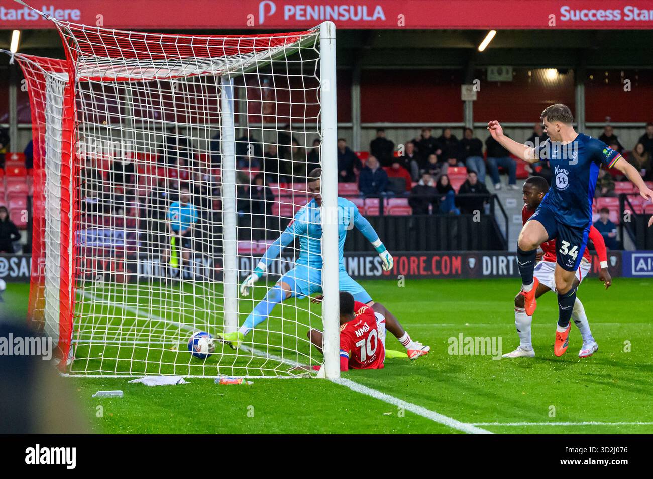 Kelly Nmai of Salford City FC puts the ball in the Lincoln Goal only ...