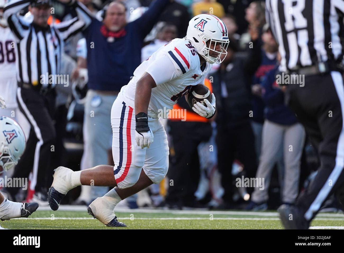Arizona defensive lineman Leroy Palu recovers a fumble by Colorado ...
