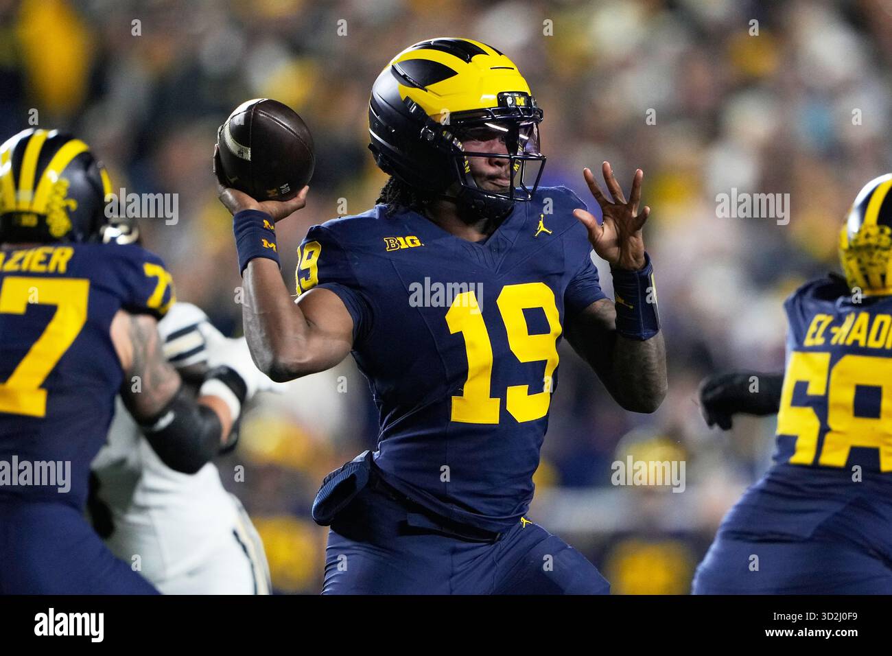 Michigan quarterback Bryce Underwood throws during the first half of an NCAA college football ...