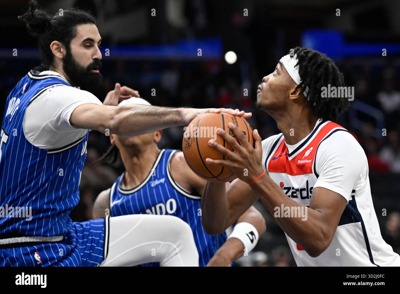 Orlando Magic center Goga Bitadze, left, blocks the shot of Washington ...
