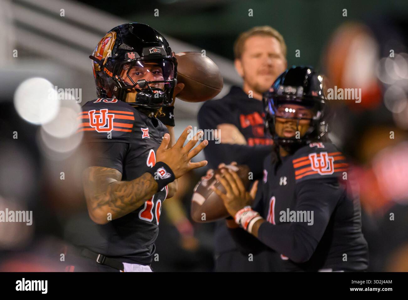 Utah quarterback Byrd Ficklin, left, and quarterback Devon Dampier ...