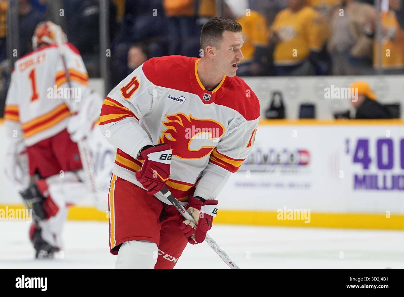 Calgary Flames left wing Jonathan Huberdeau (10) warms up before an NHL ...