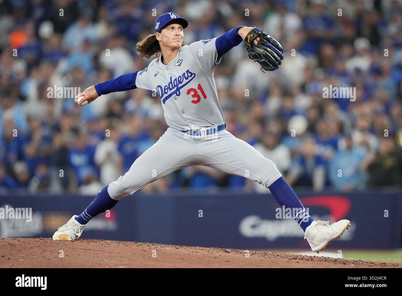 Los Angeles Dodgers pitcher Tyler Glasnow delivers against the Toronto ...