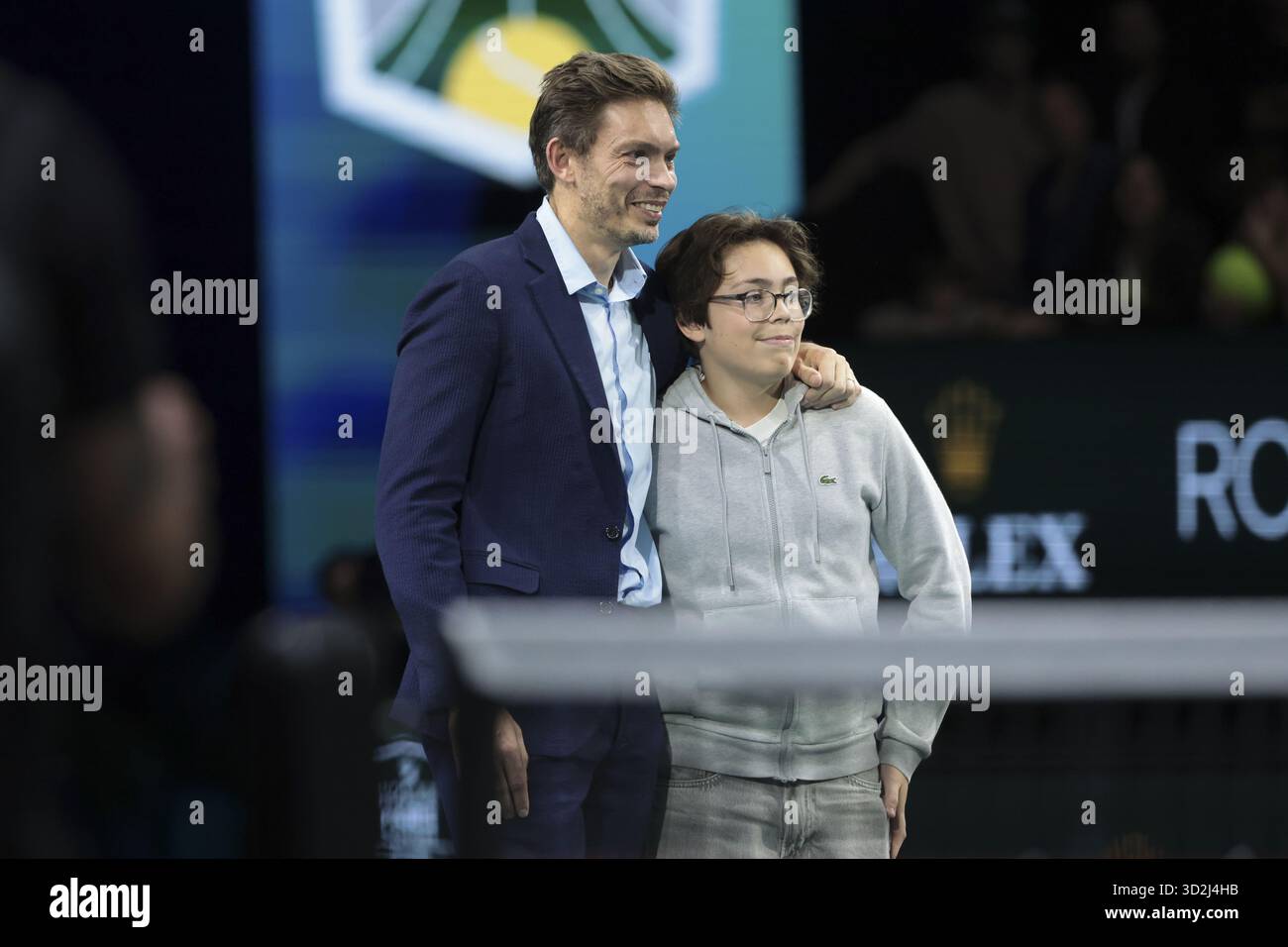 Nicolas Mahut of France - with his son Natanel Mahut - during a ...