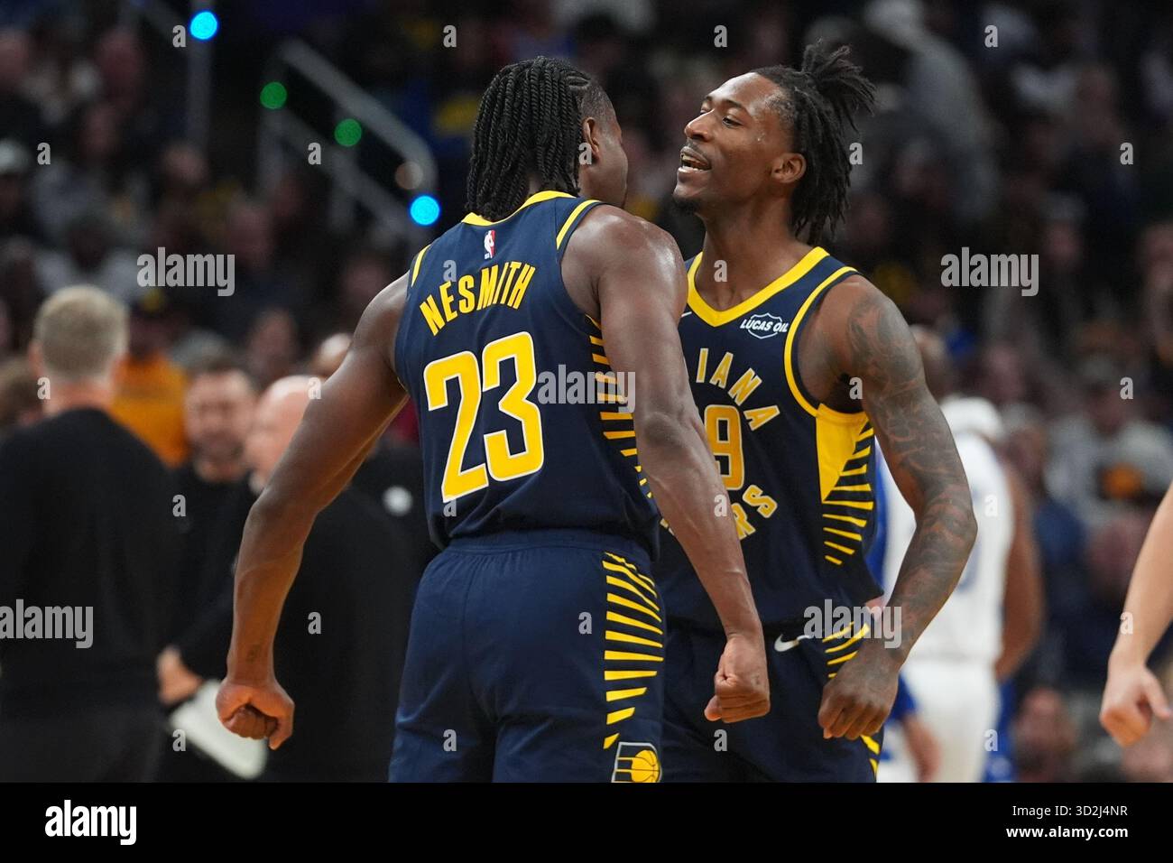 Indiana Pacers' Aaron Nesmith (23) and Quenton Jackson react during the ...