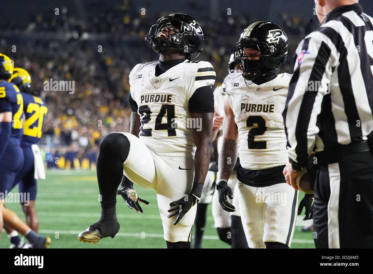 Purdue running back Malachi Thomas (24) reacts near wide receiver ...