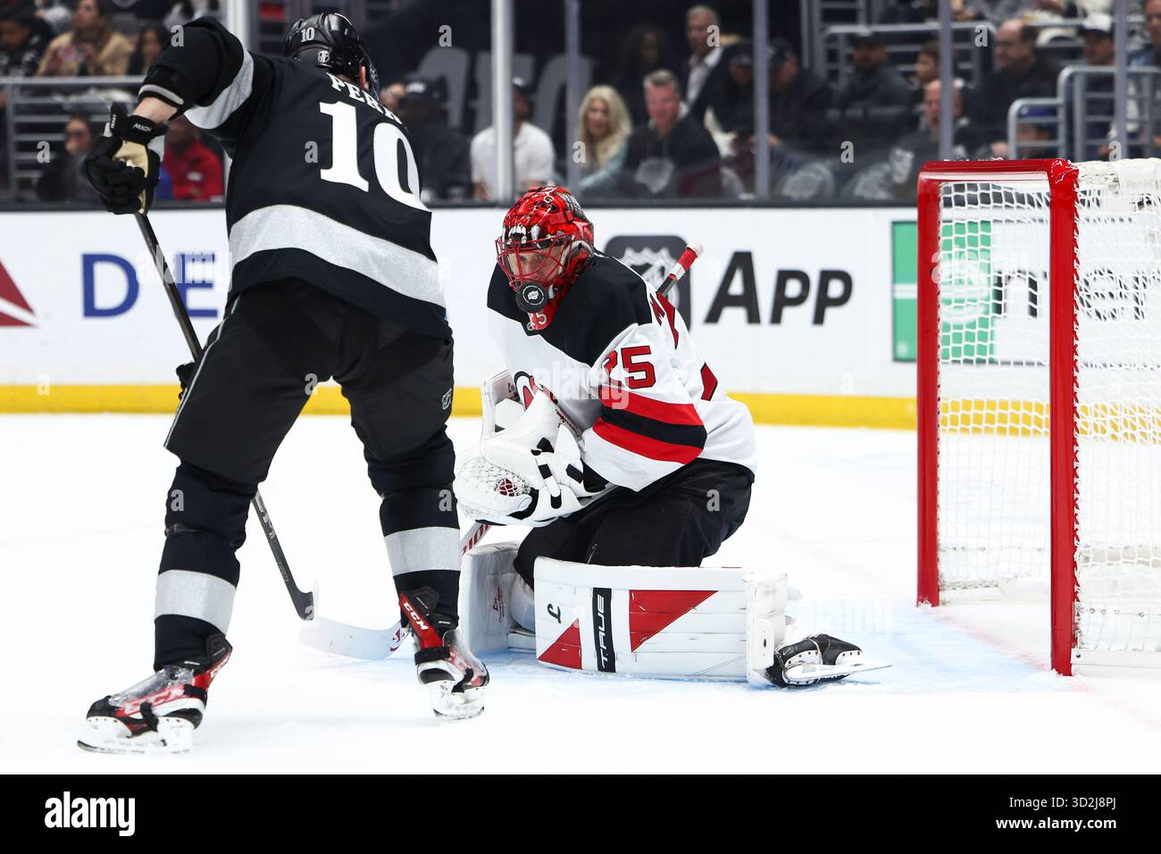 New Jersey Devils goaltender Jacob Markstrom (25) makes a save against ...