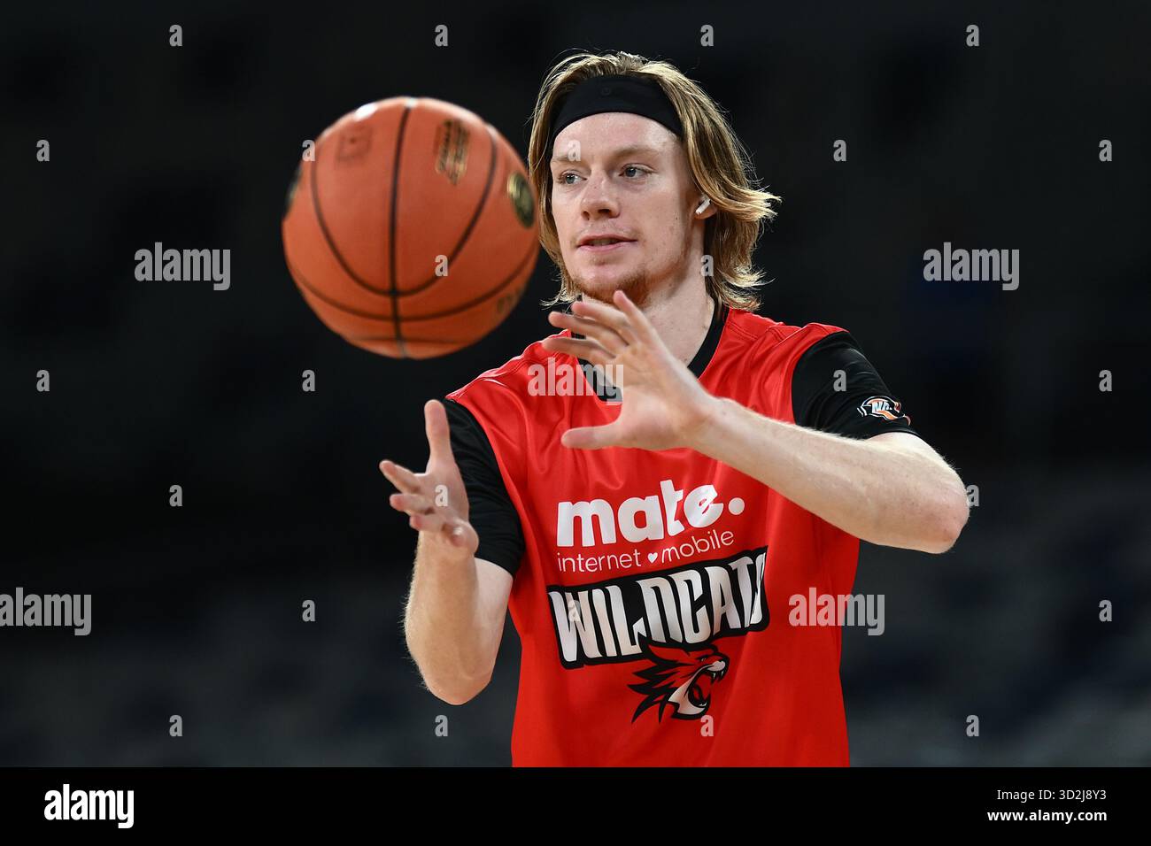 Jaron Rillie of the Wildcats warms up ahead of the NBL Round 7 match ...