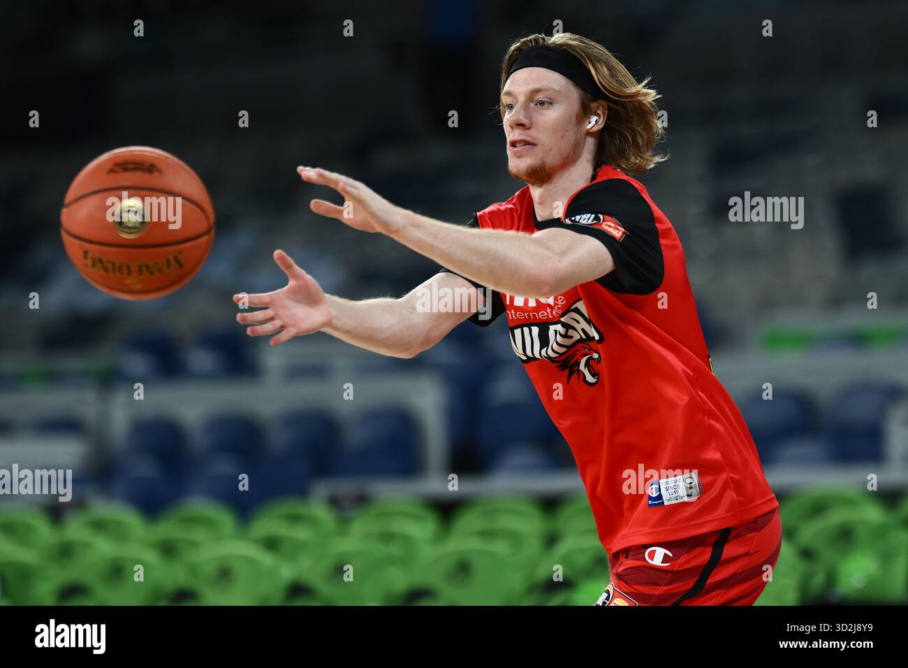 Jaron Rillie of the Wildcats warms up ahead of the NBL Round 7 match ...